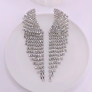 8 Other Reasons | Jewelry | Revolve Angel Wing Earrings Silver | Poshmark